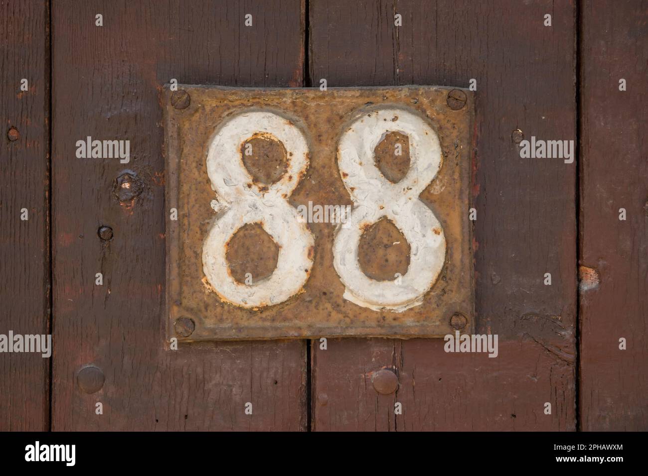 Old retro weathered cast iron plate with number 88 Stock Photo - Alamy