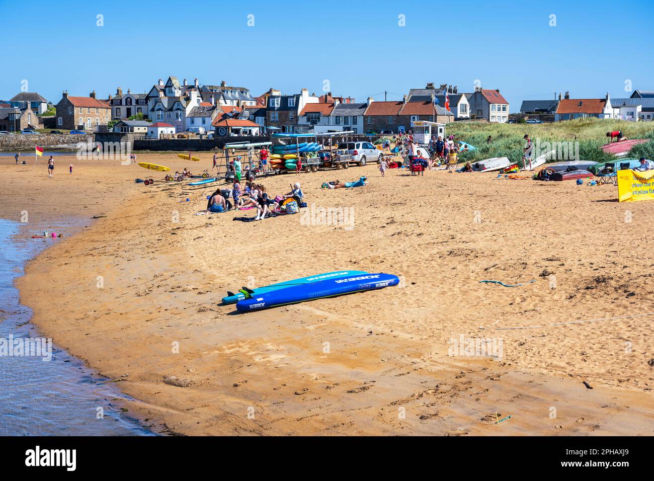 Visitors enjoying the summer sunshine on Elie beach - Elie, East Neuk ...