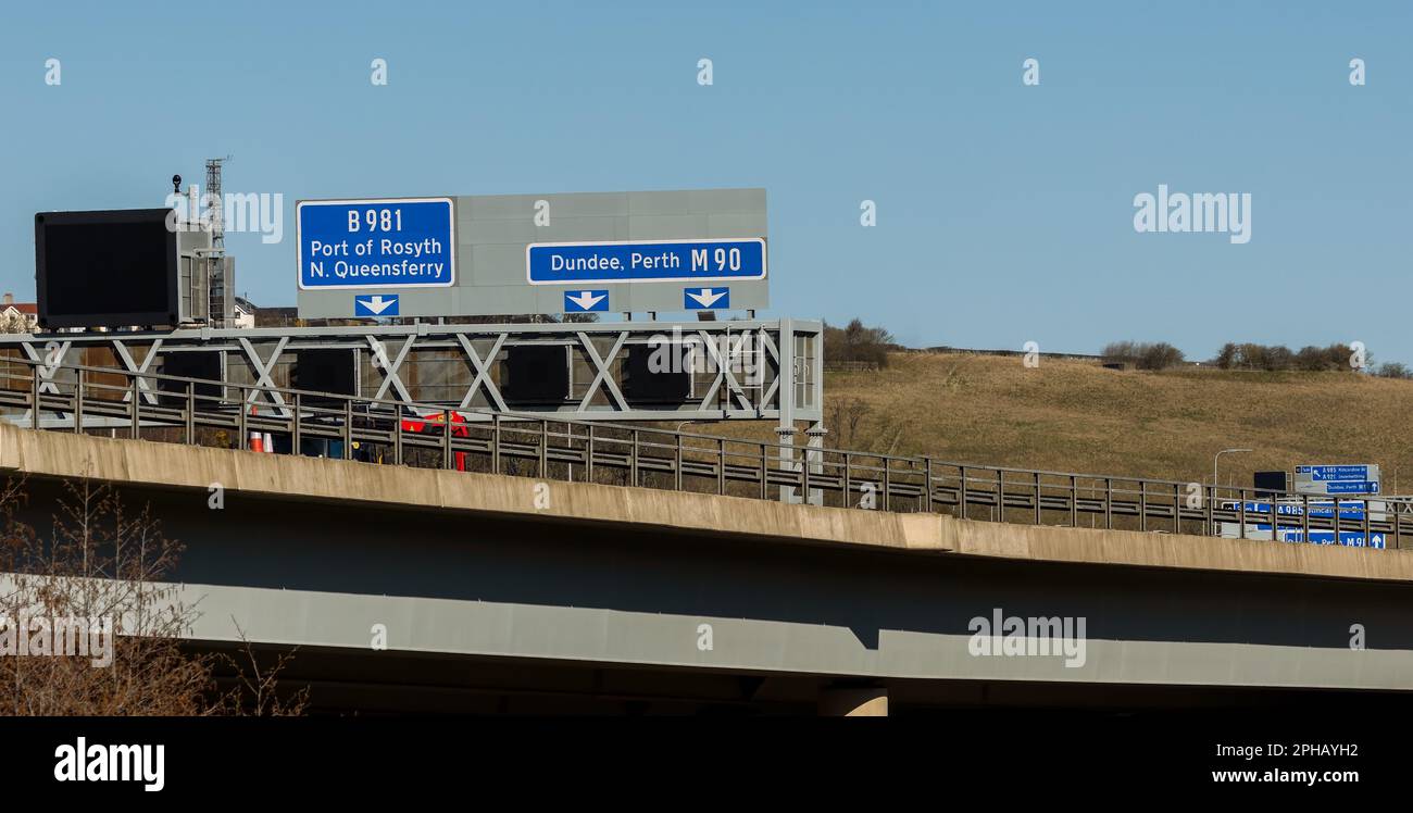 M90 Motorway leading North with signs letting you know the direction to ...