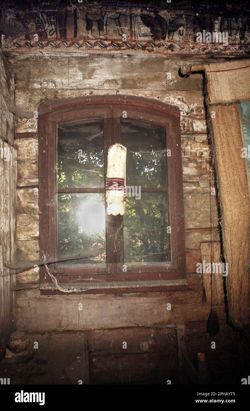 Alun, Hunedoara County, Romania, 2003. Interior of the abandoned wooden ...