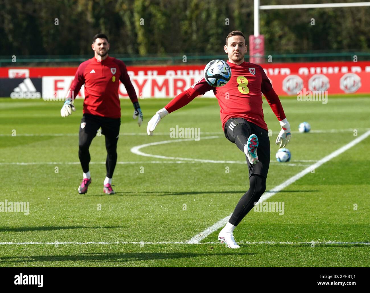 Wales goalkeeper Danny Ward (right) during a training session at Vale ...