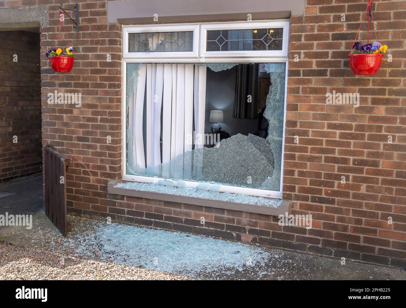The smashed window of a property in the Moyne Gardens area of ...