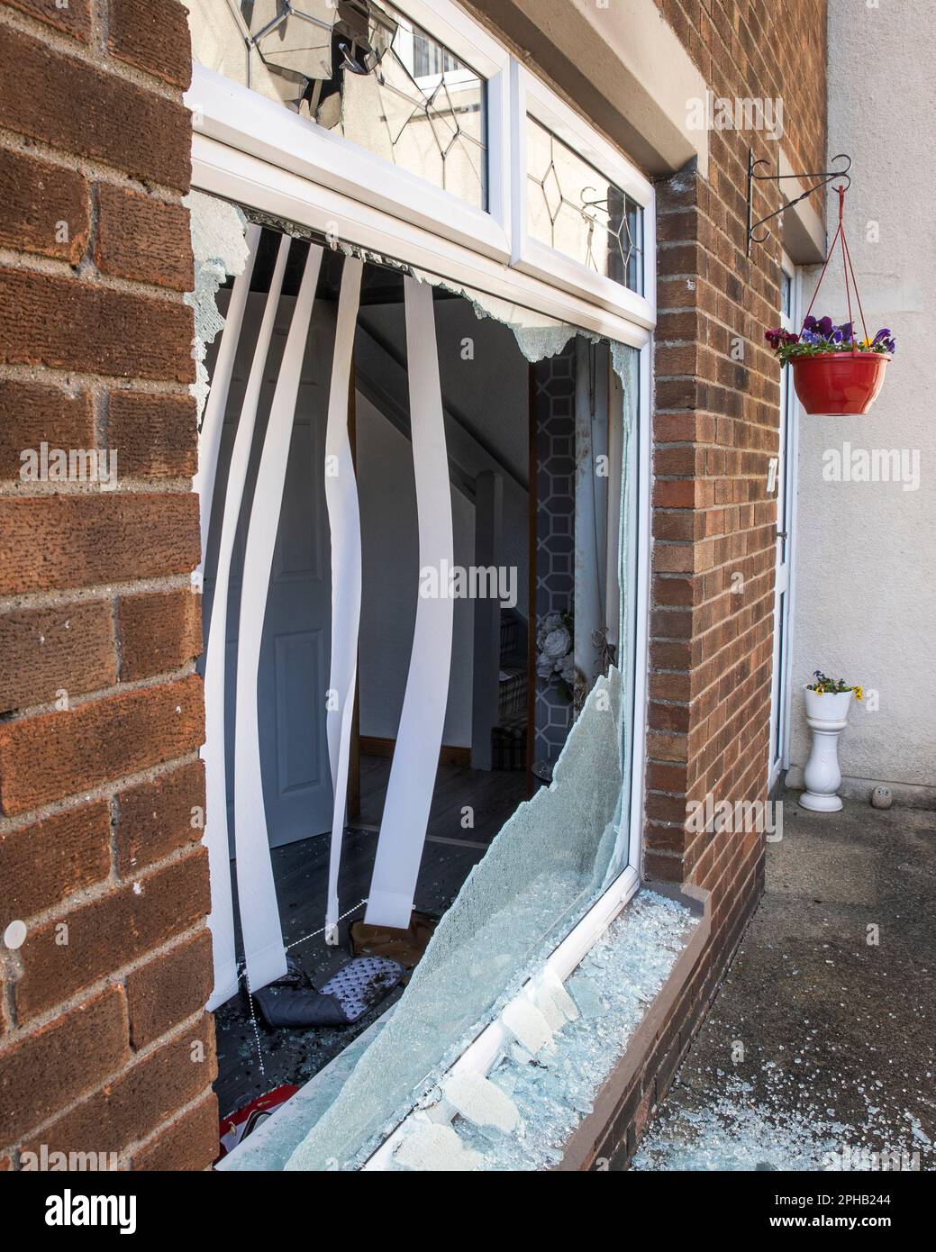 The smashed window of a property in the Moyne Gardens area of ...
