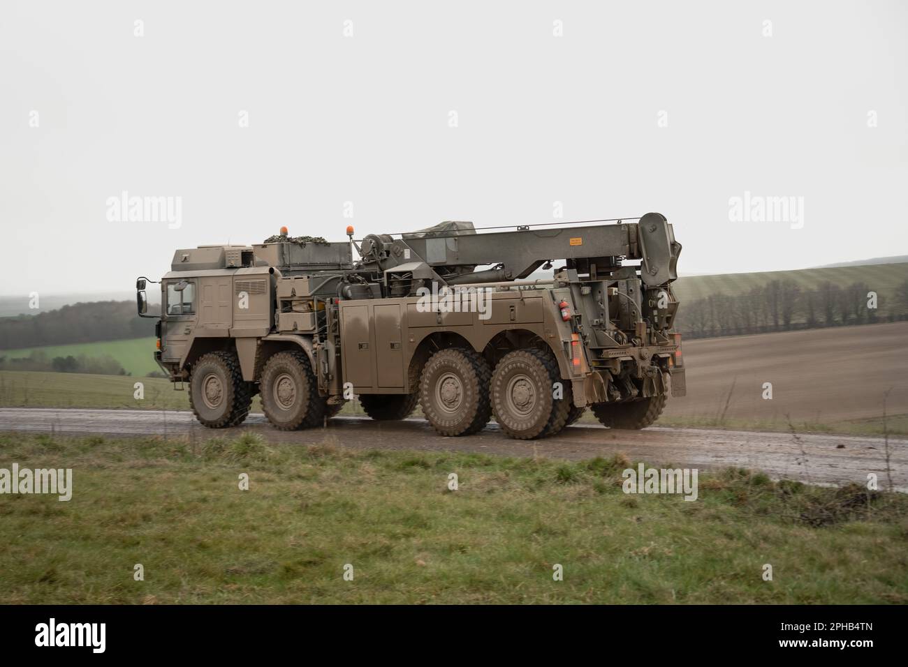 British army MAN SX45 32.430 8x8 Recovery Truck in action on a military ...