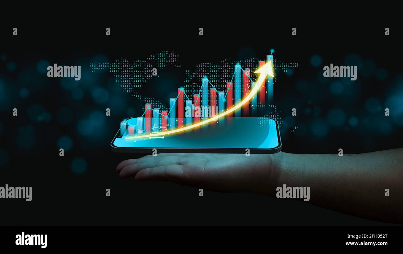 Businessman holding mobile phone with stock market graph and arrow on ...