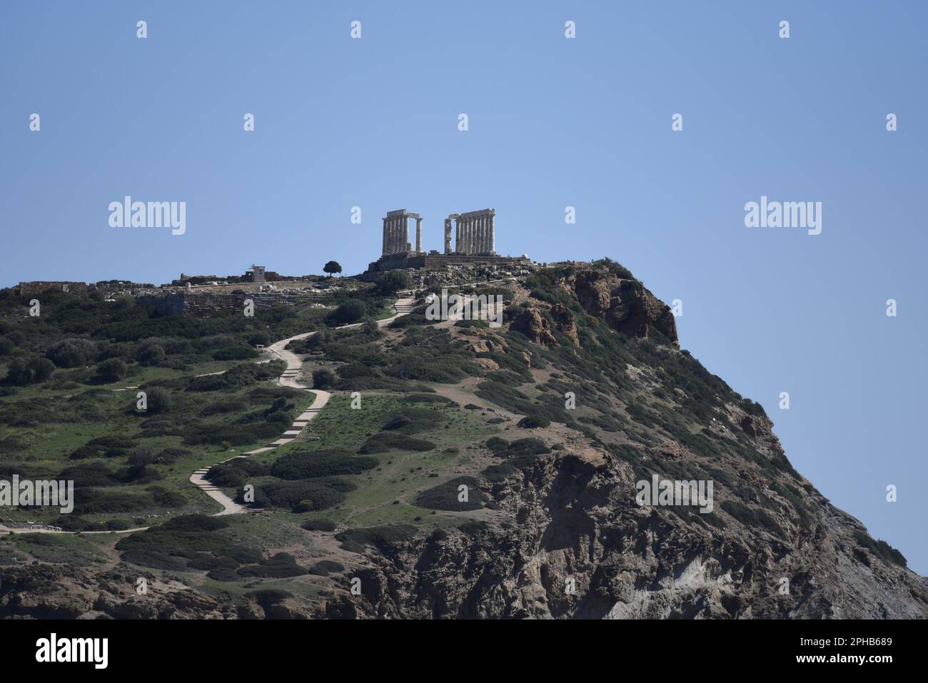 Landscape with scenic view of the Temple of Poseidon an ancient ...