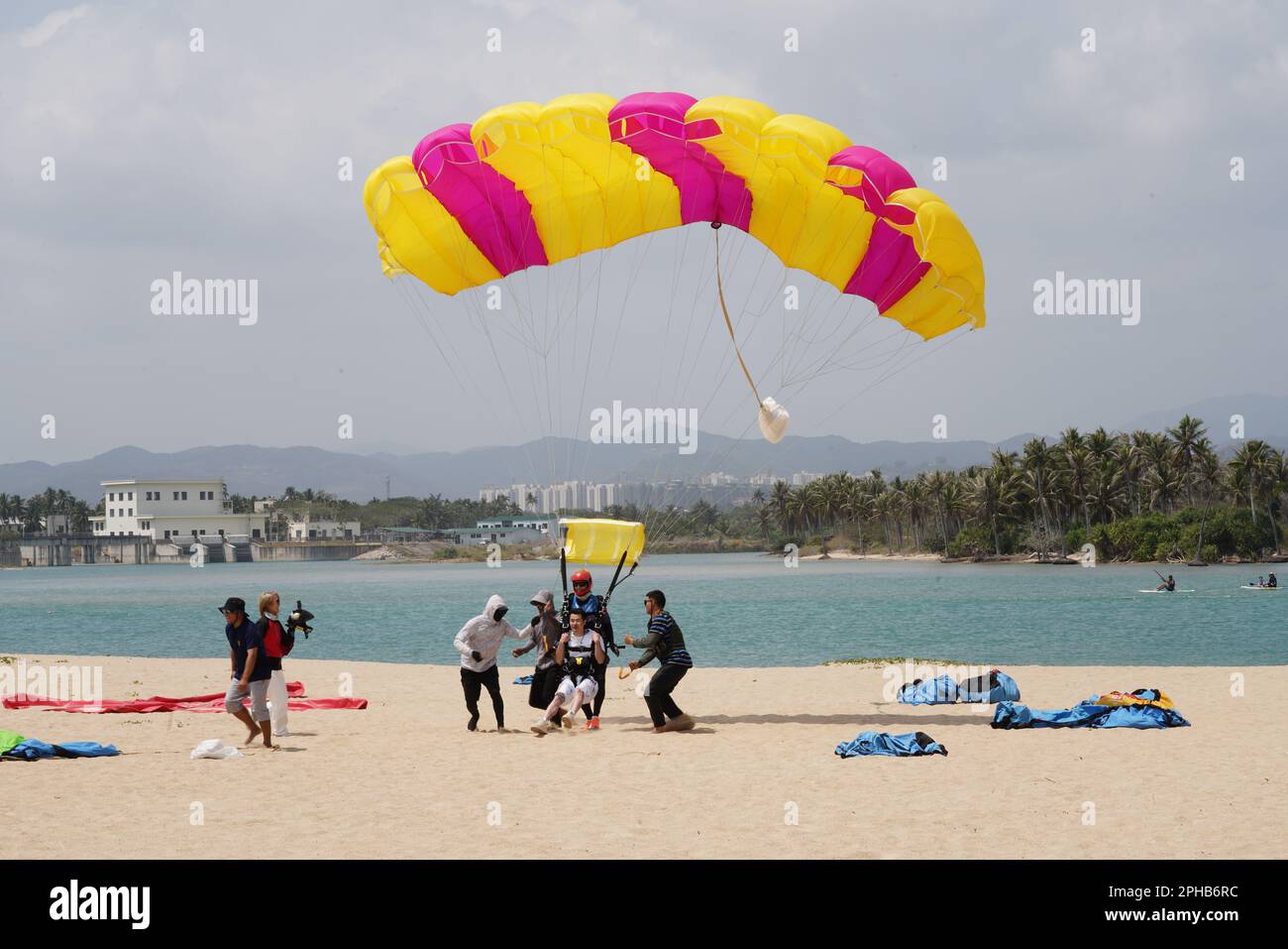 Sanya, China's Hainan Province. 14th Mar, 2023. A man lands on a beach ...