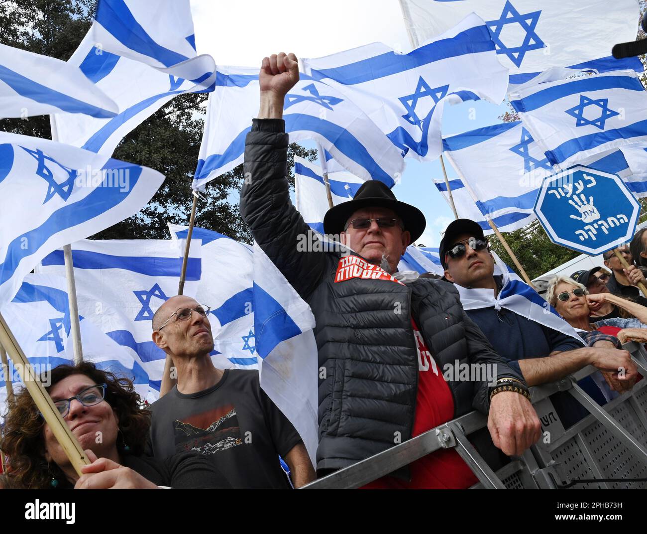 Jerusalem, Israel. 27th Mar, 2023. Israelis wave the national flag at a ...