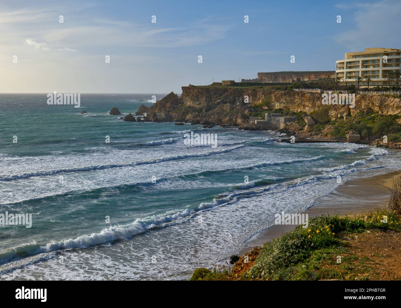 Hotel on the cliff over Ramla Beach, Melieha, Malta Stock Photo - Alamy