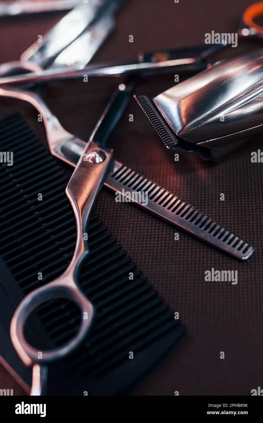 Close up view of vintage barber shop tools that lying down on the table ...