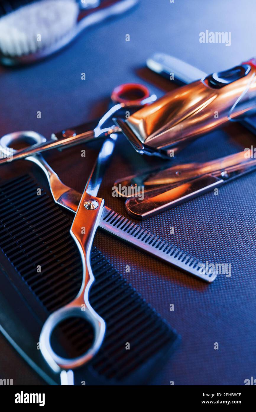 Close up view of vintage barber shop tools that lying down on the table ...