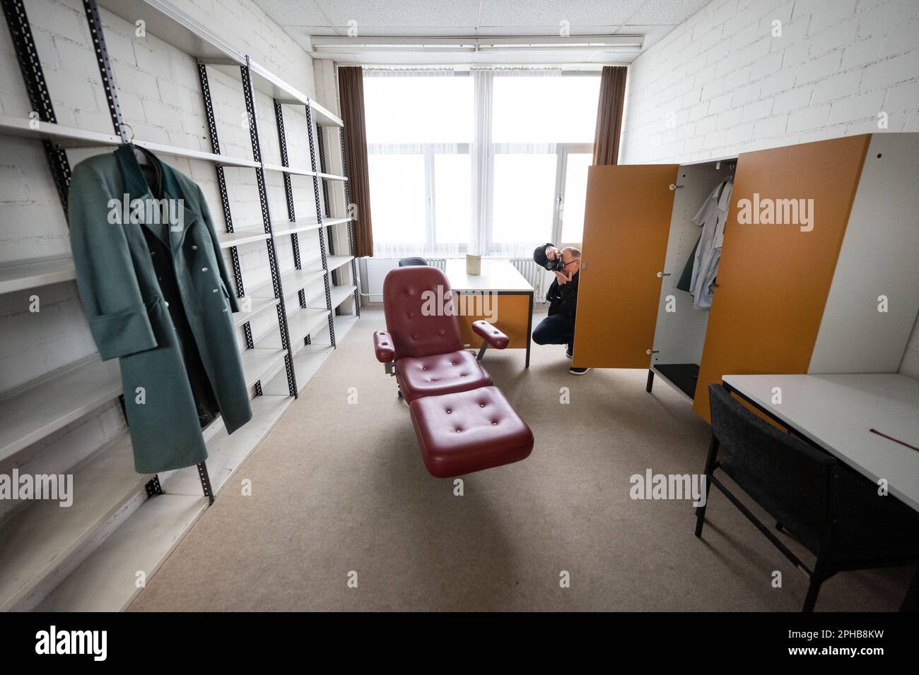 Stuttgart, Germany. 27th Mar, 2023. A couch and a uniform are seen in a ...