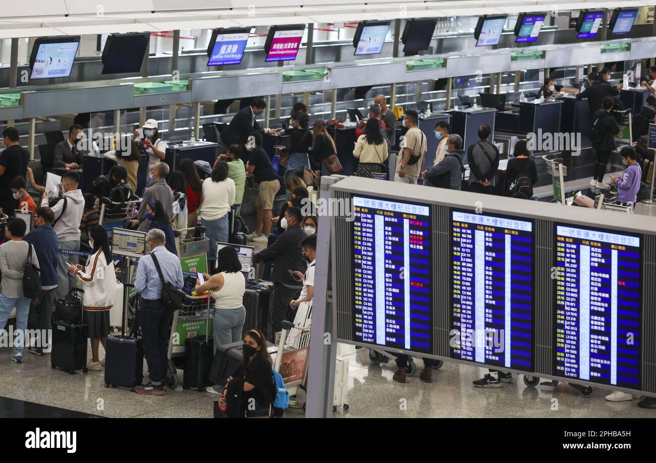 Passengers at the departure hall of the Hong Kong International Airport ...