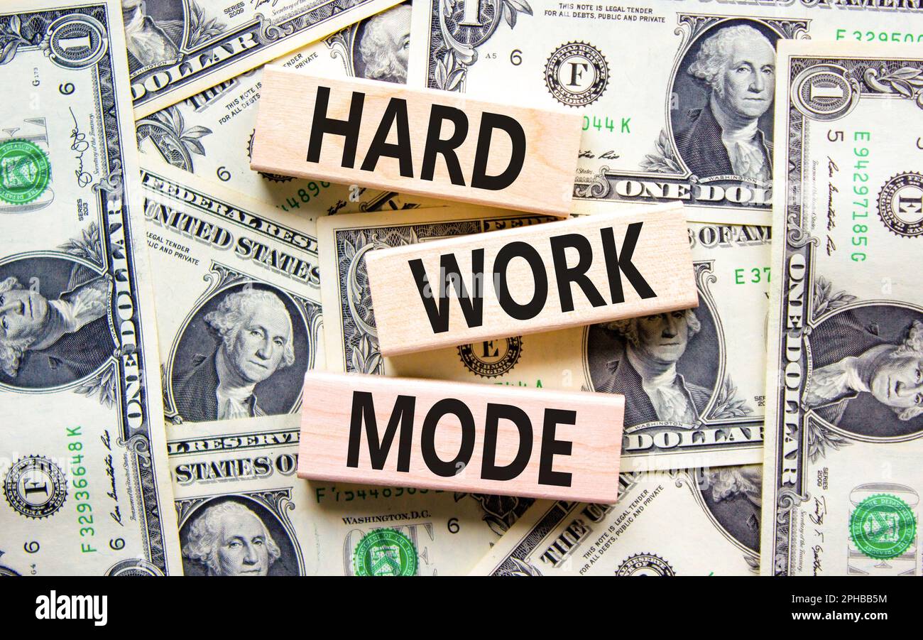 Hard work mode symbol. Concept words Hard work mode on wooden block on ...