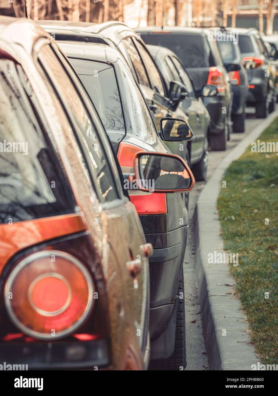 Many cars parked on the sidewalk and street in Bucharest, Romania Stock ...