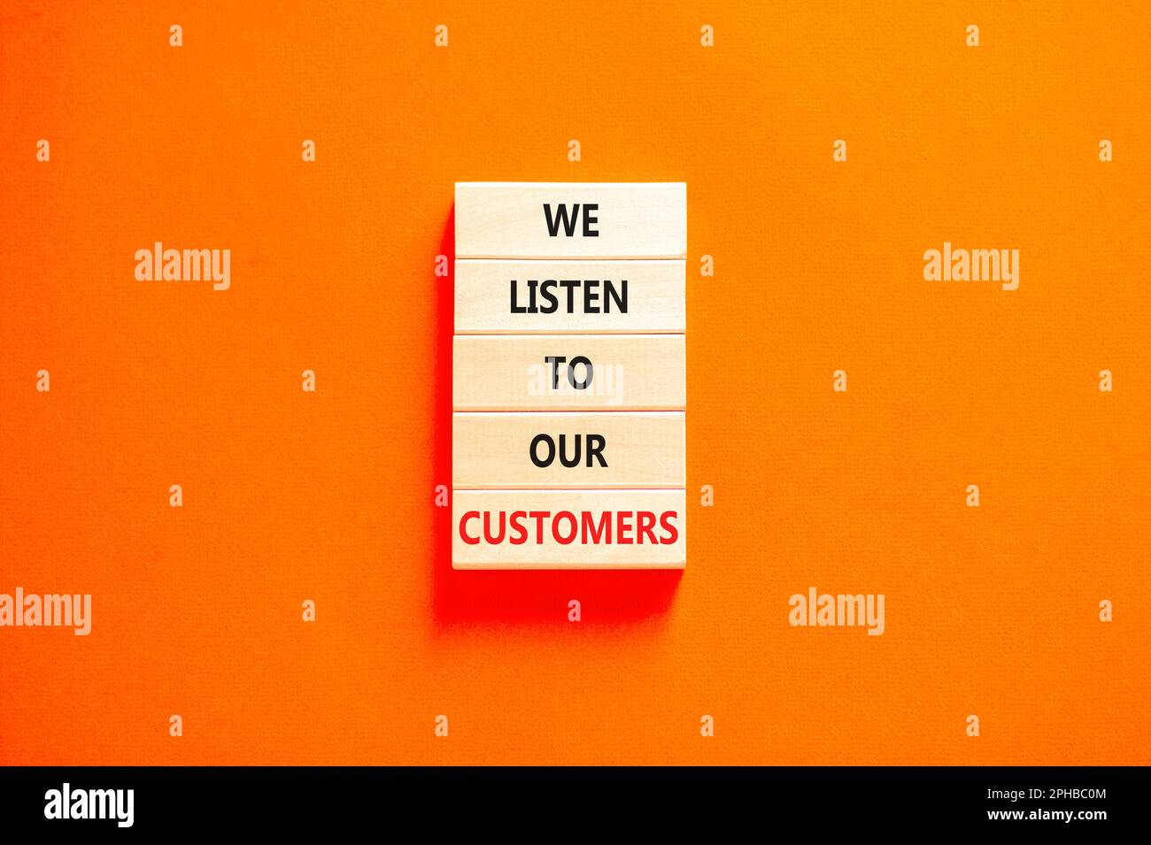 We listen to our customers symbol. Concept words We listen to our ...