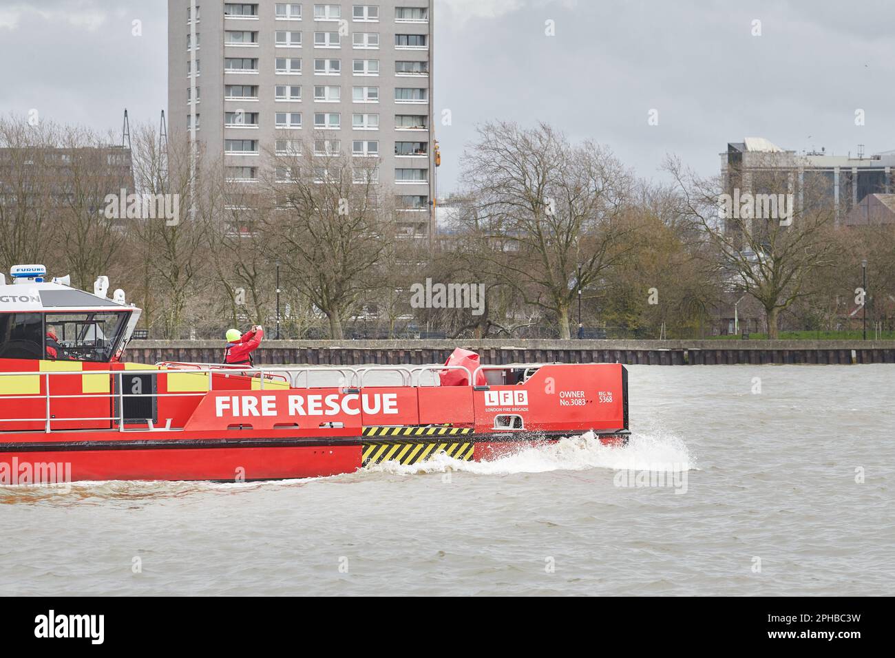 A conspicuously red colored boat of the London Fire Bregade on the ...