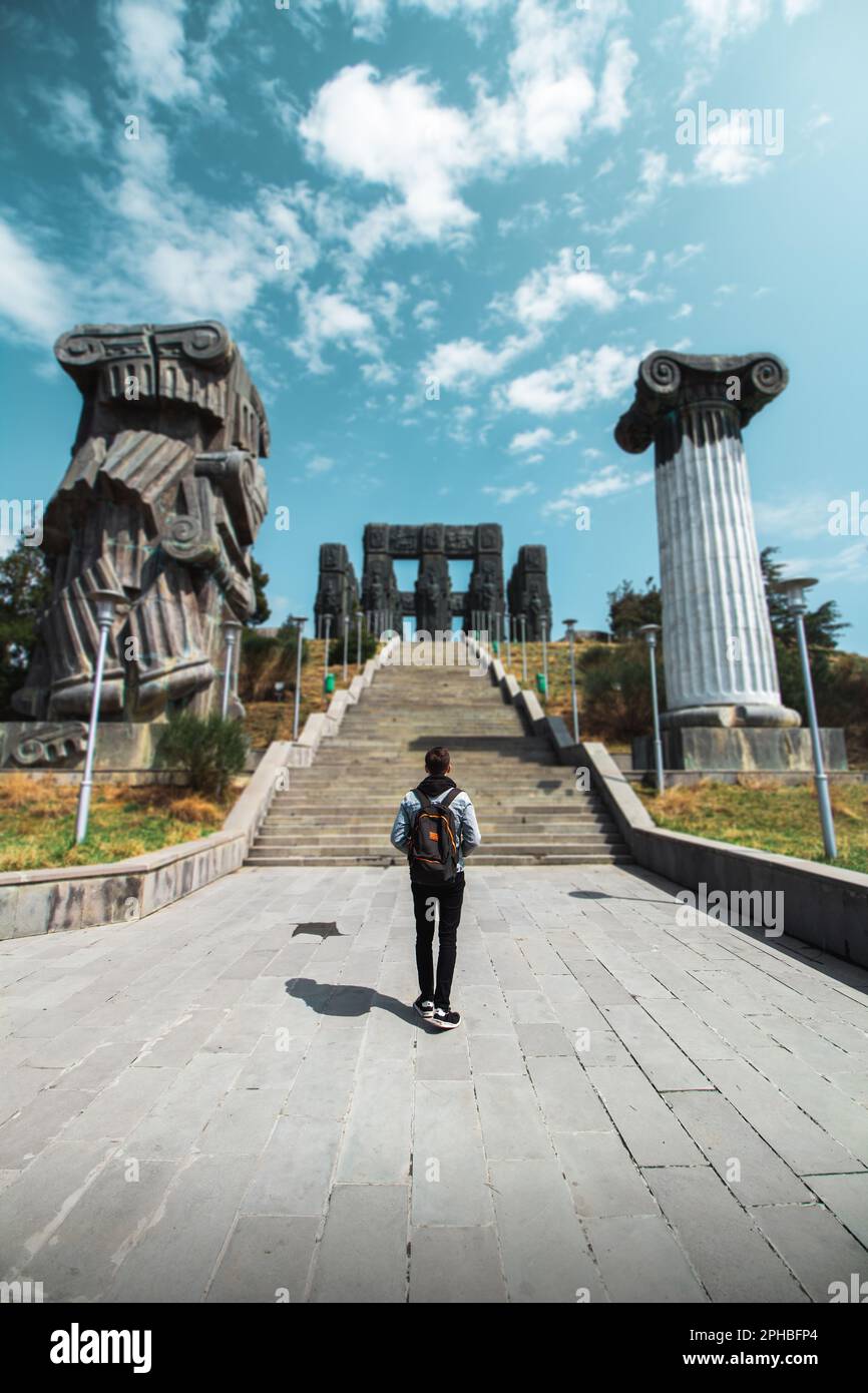 Man outside the entrance to The Chronicles of Georgia, Tbilisi, Georgia ...