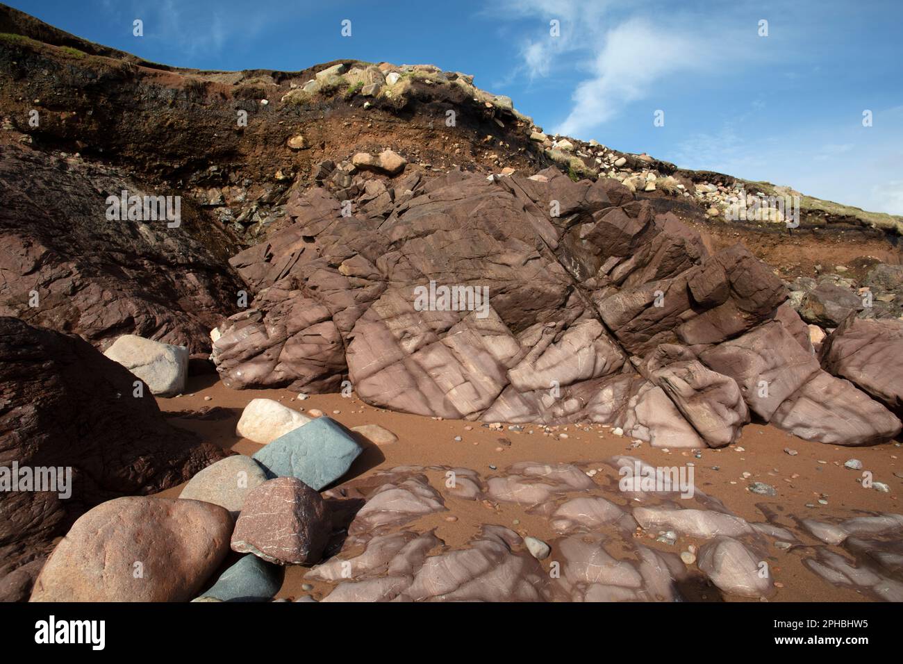 The granite cliffs of Da Neap in the east contrast with the basalt and ...
