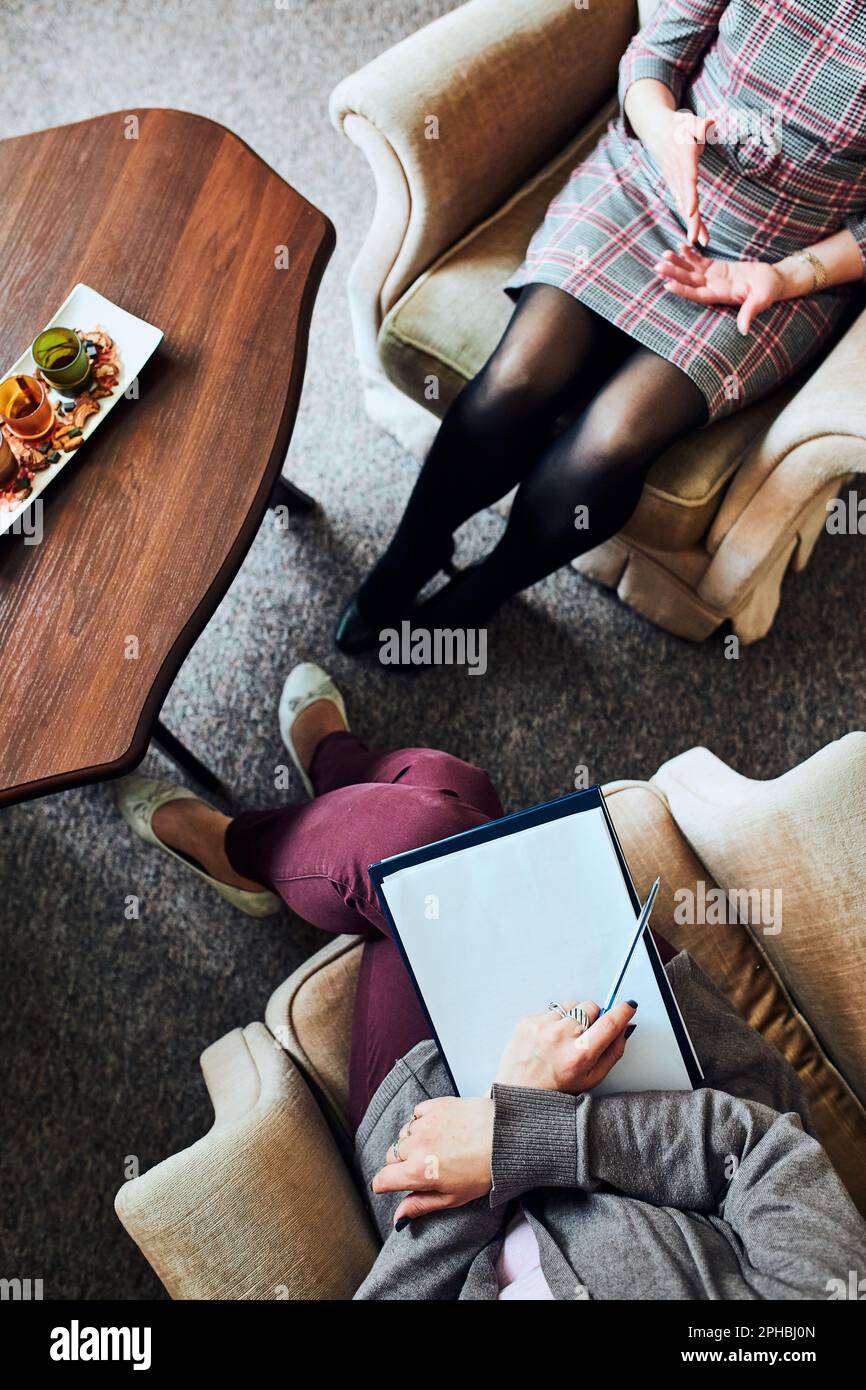 Professional psychologist doctor giving the consult to female patient ...