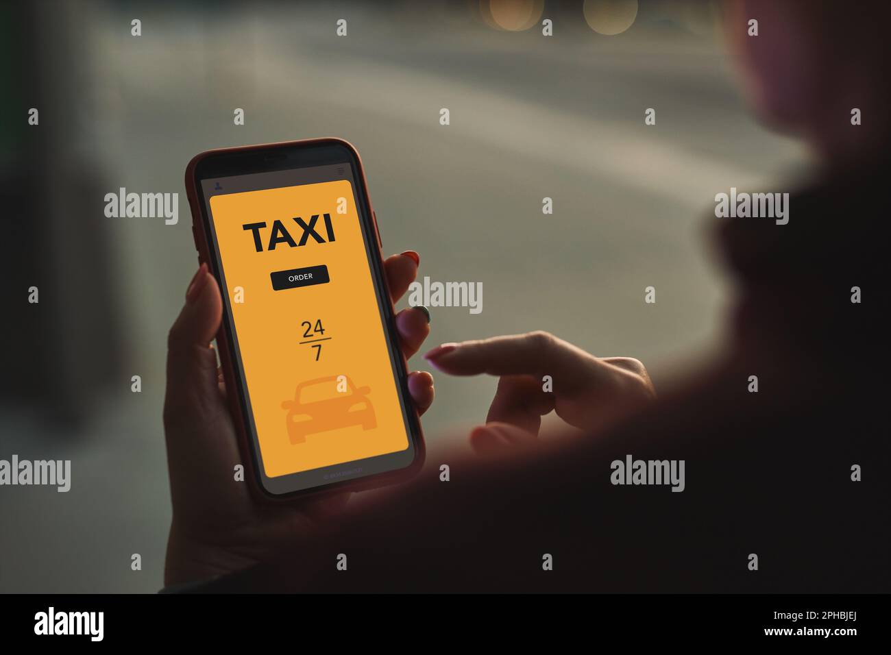 Woman ordering taxi online using mobile app on smart phone. Booking ...