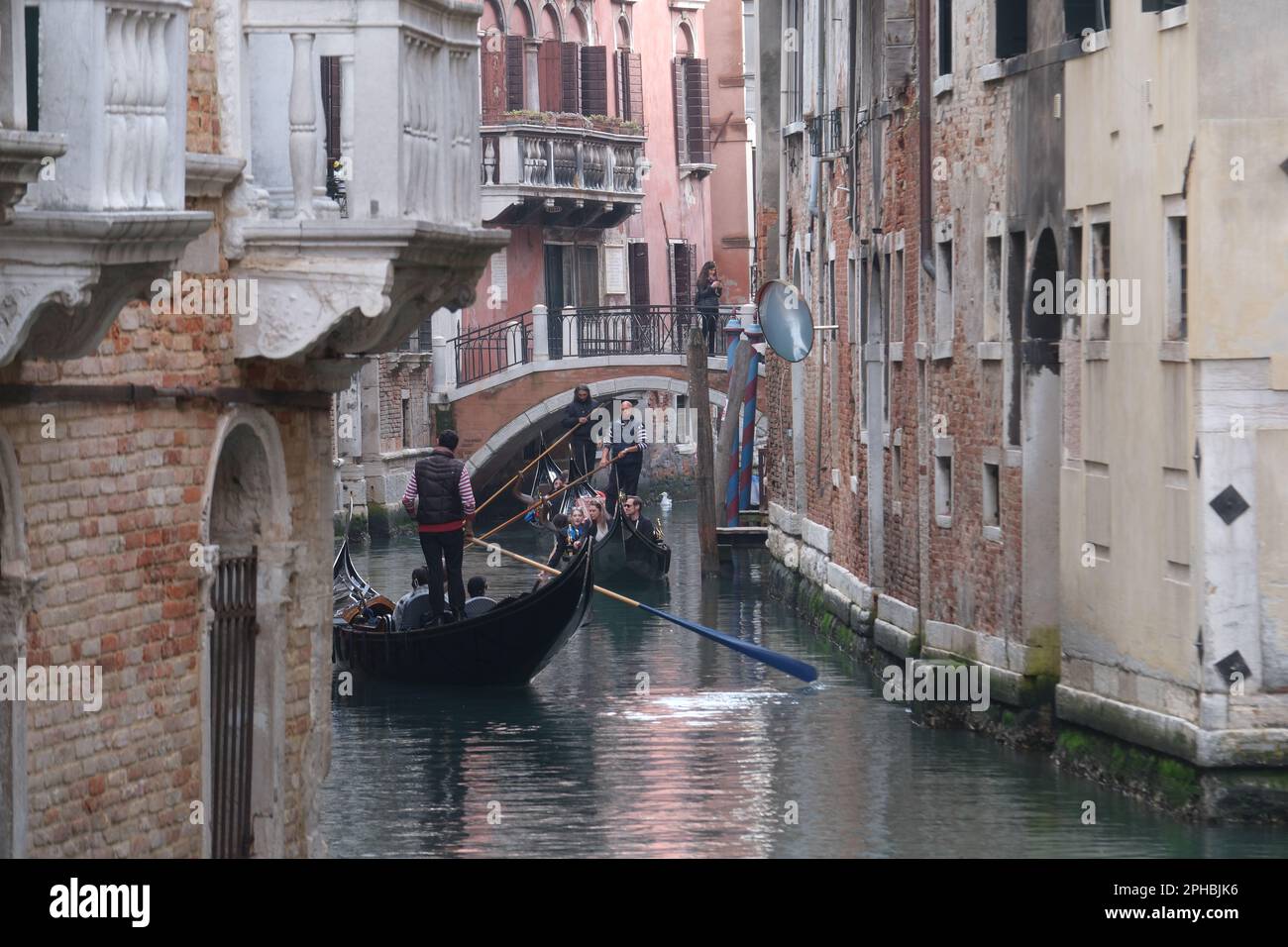 gondoliers row their own gondolas along the canals of venice Gondoliers ...