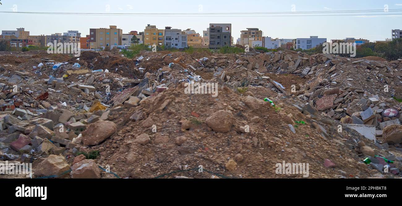 Piles of rubble riddled with rubbish on the outskirts of a Tunisian ...