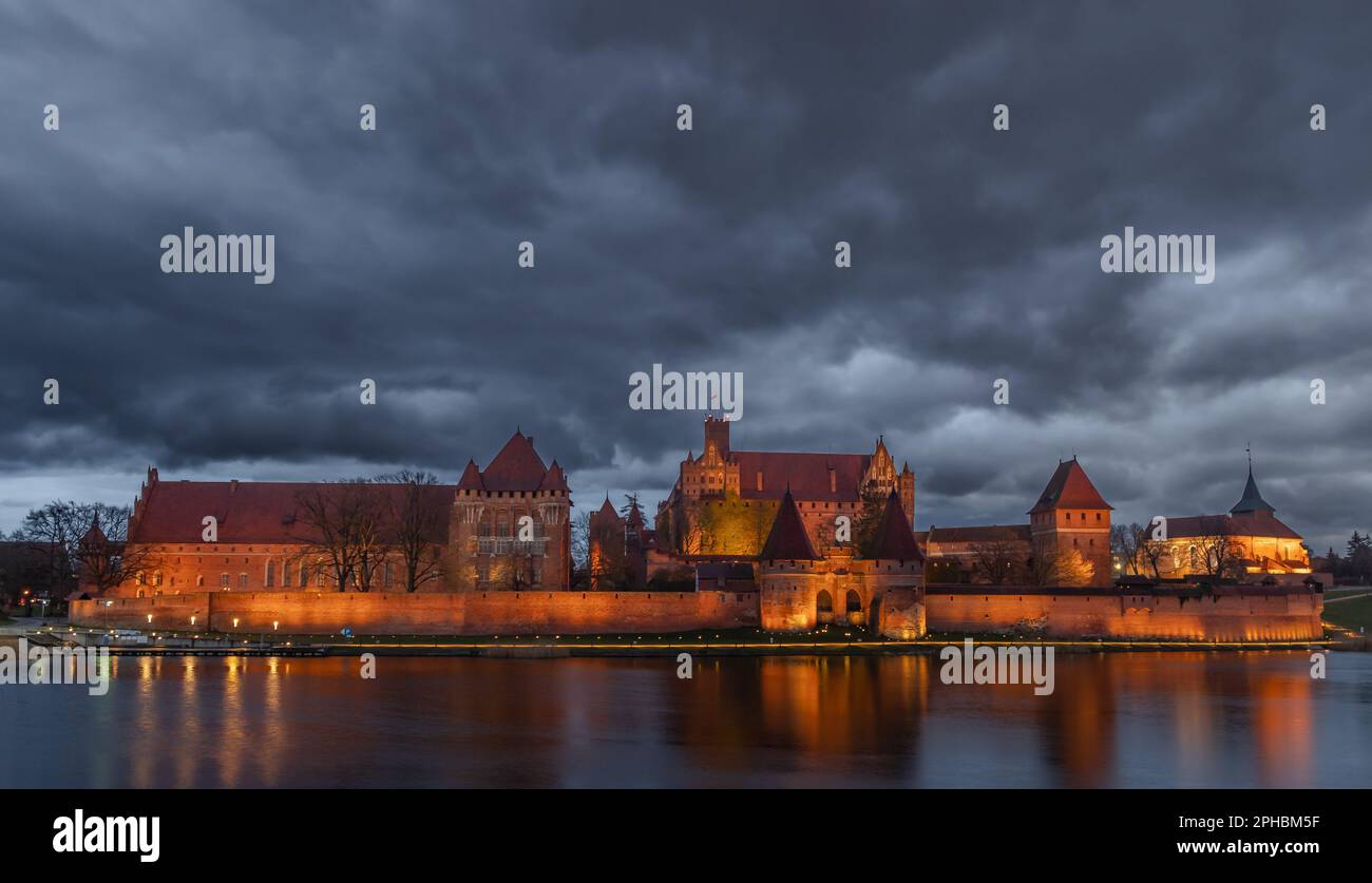 old teuton castle in Malbork at evening Stock Photo - Alamy
