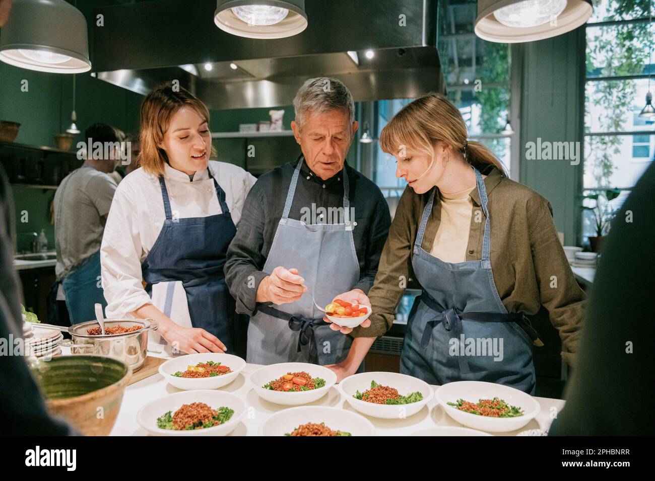 Male female chef explaining hi-res stock photography and images - Alamy