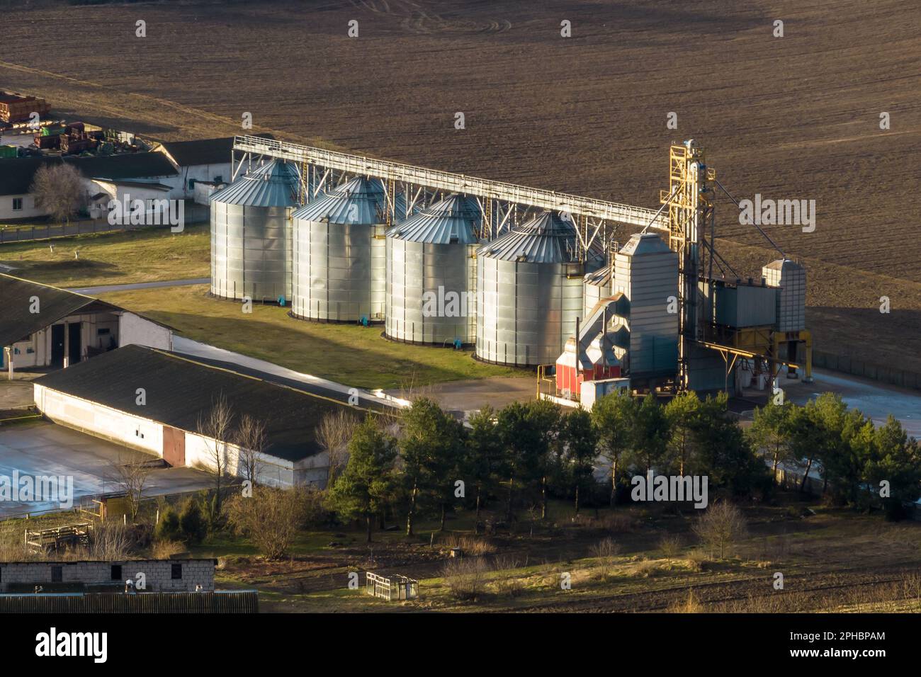 aerial panoramic view on agro-industrial complex with silos and grain ...