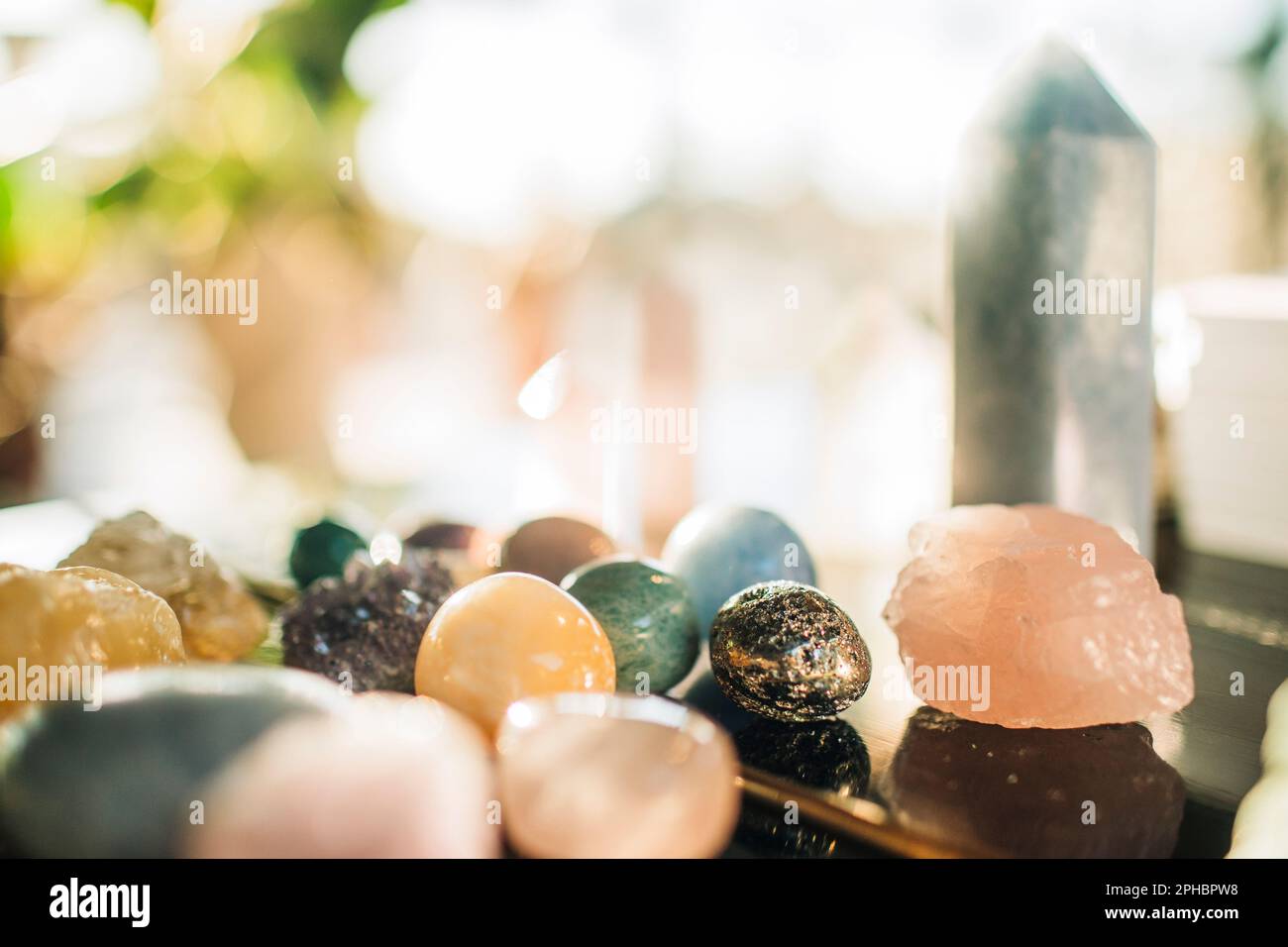 Gemstones and crystals arranged on table at retreat center Stock Photo ...