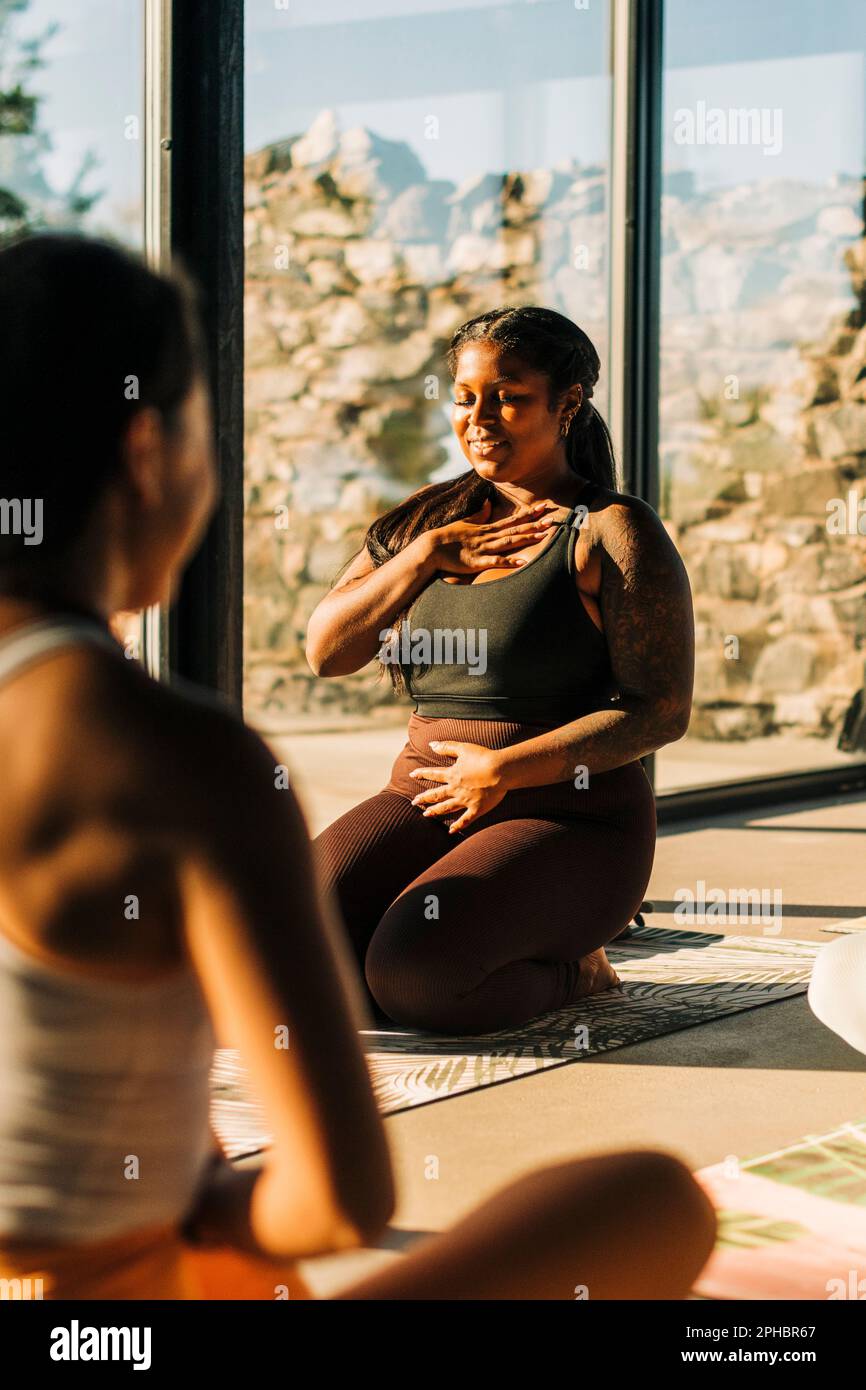 Woman practicing yoga exercise hi-res stock photography and images - Alamy