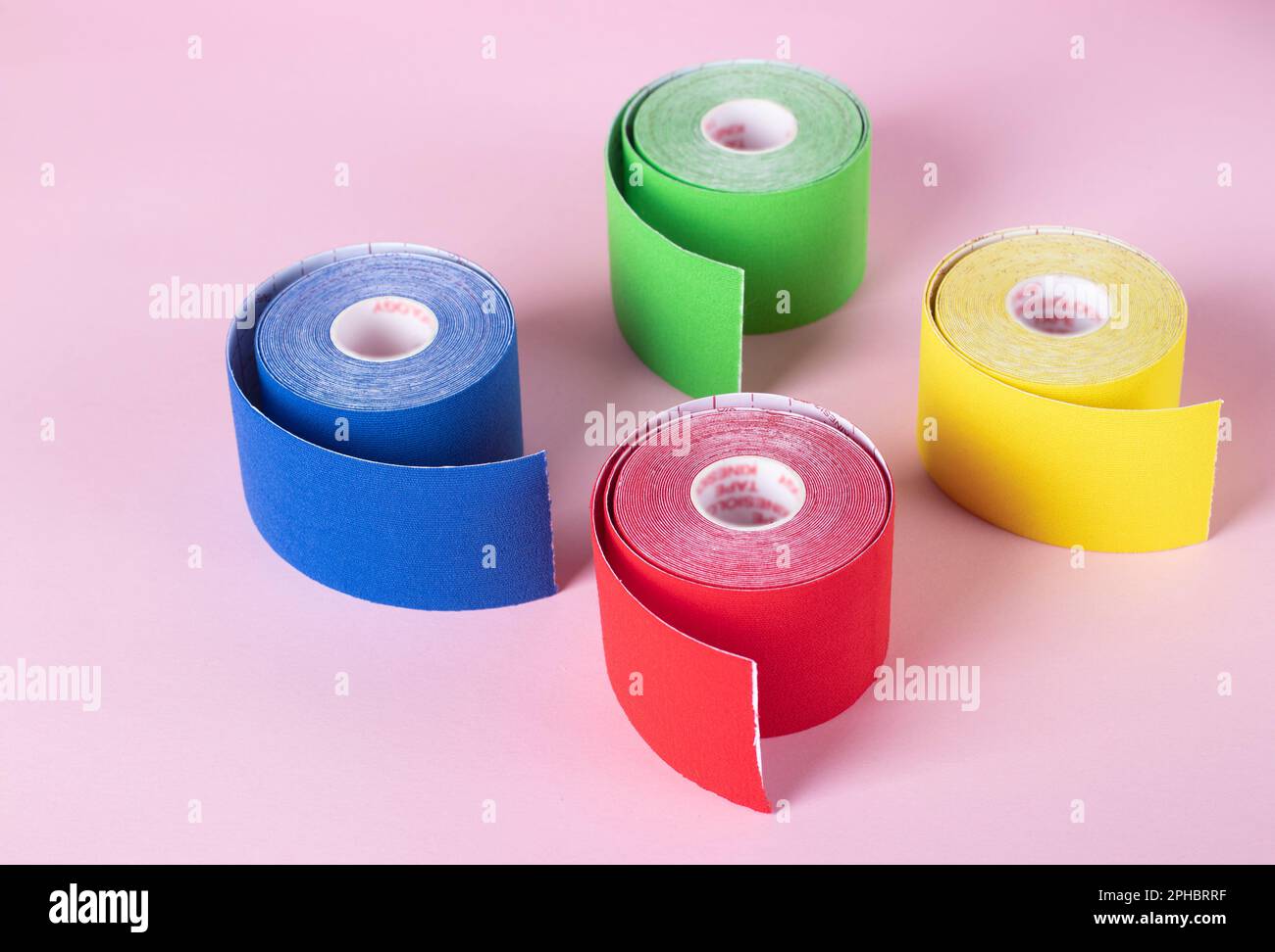 Colorful kinesiology tape on pink background, kinesiology taping lymph ...