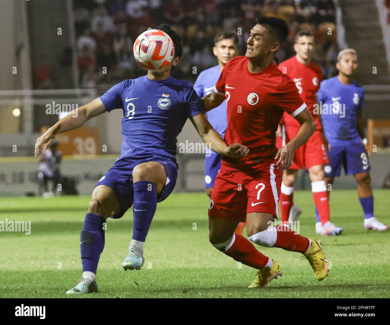 Singapore's Lionel Tan Han-wei (8) and Hong Kong's Law Tsz-chun (7) in ...