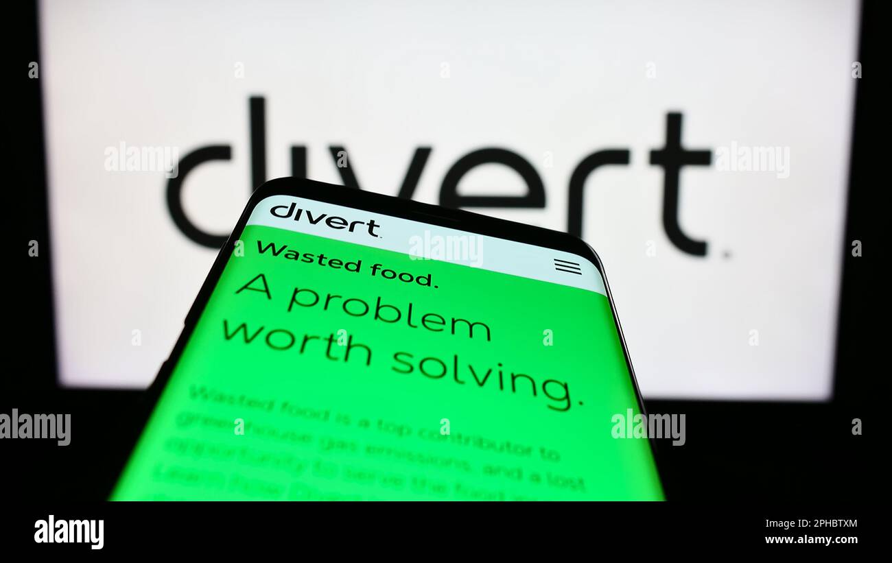 Mobile phone with webpage of US food technology company Divert Inc. on ...