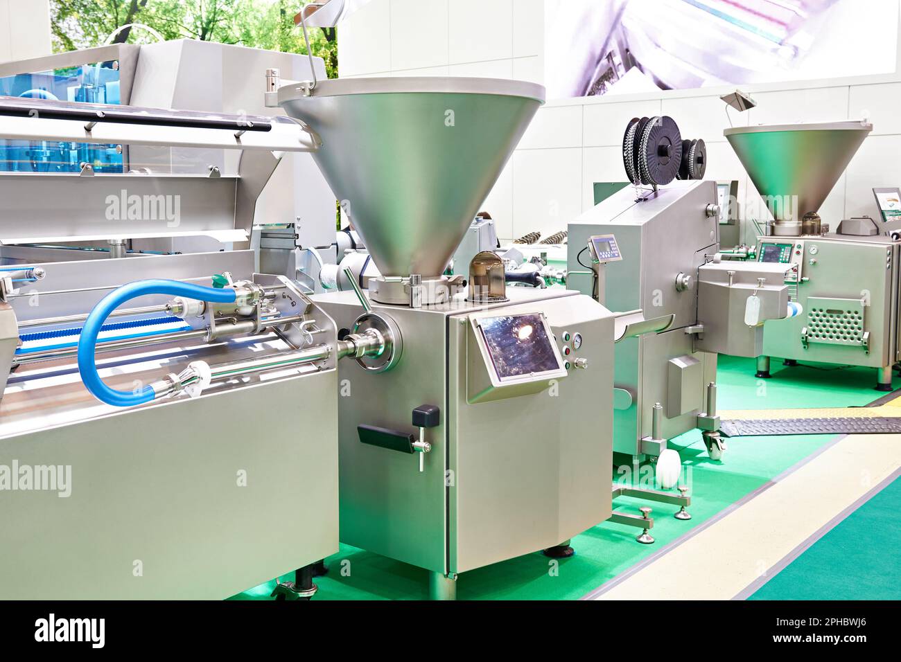 Industrial equipment for sausage line on exhibition Stock Photo - Alamy