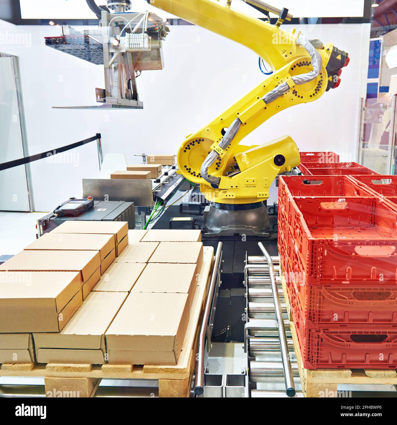 Standard multipurpose robot and boxes Stock Photo - Alamy