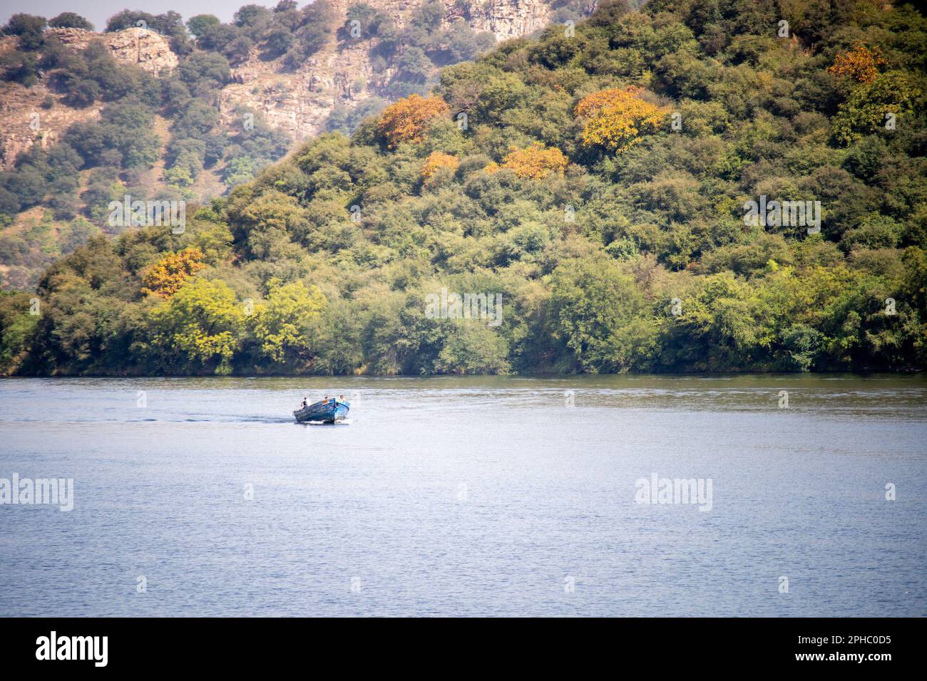 aerial drone shot of handmade boat used by rural villagers to cross ...