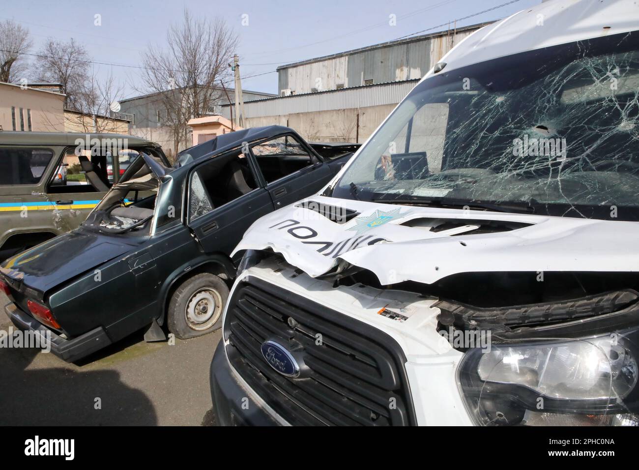 BOIARKA, UKRAINE - MARCH 27, 2023 - Police cars that were shot at and ...