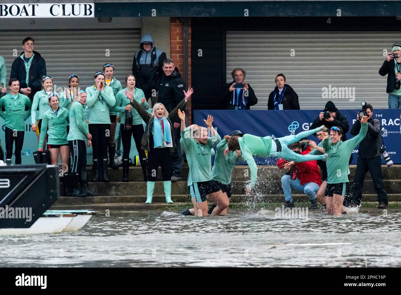 Boat Race 2023. Cambridge Men's cox Jasper Parish being thrown by team ...