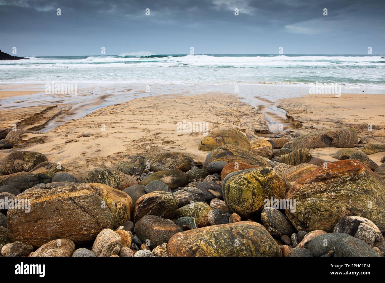 Colourful stones on beach Stock Photo - Alamy