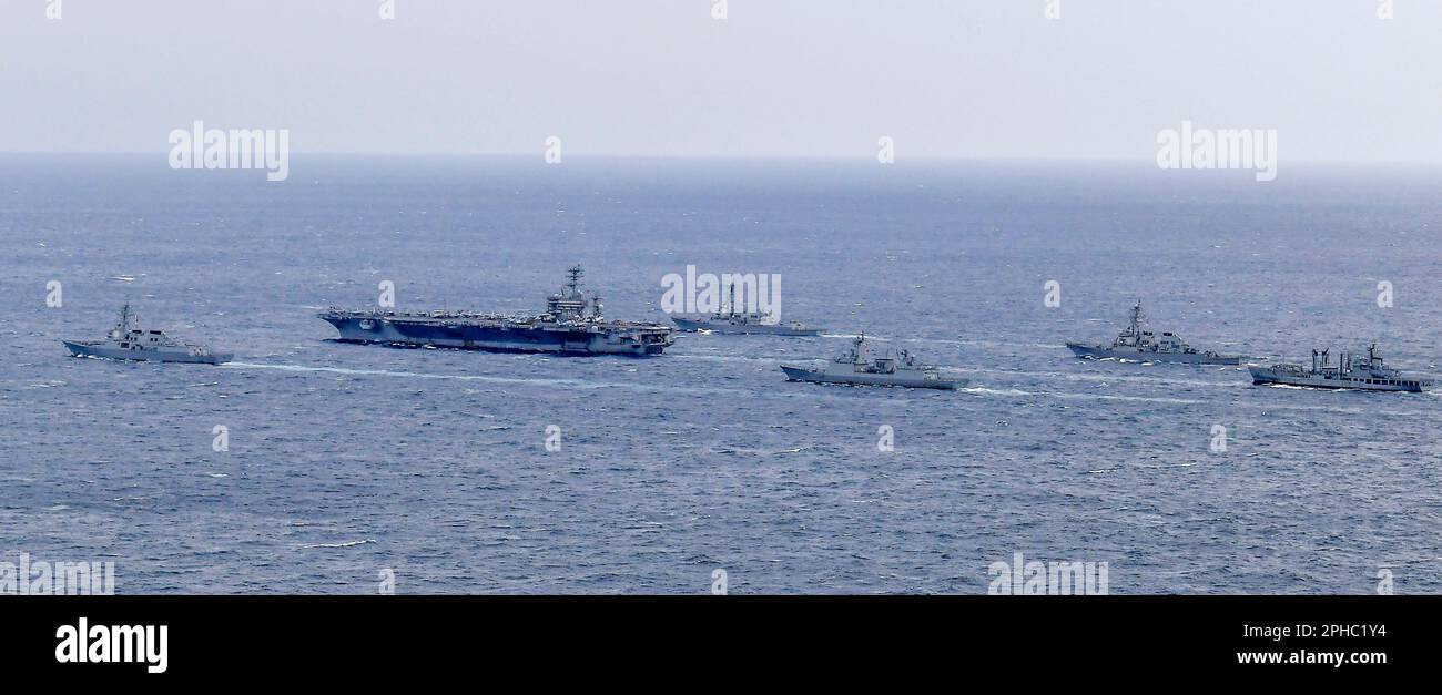 Busan, South Korea. 27th Mar, 2023. Members of the US Navy stand on ...