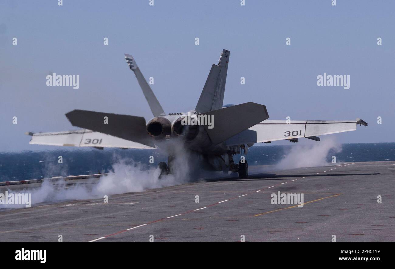 Busan, South Korea. 27th Mar, 2023. Members of the US Navy stand on ...