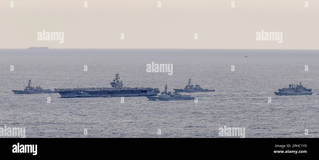 Busan, South Korea. 27th Mar, 2023. Members of the US Navy stand on ...