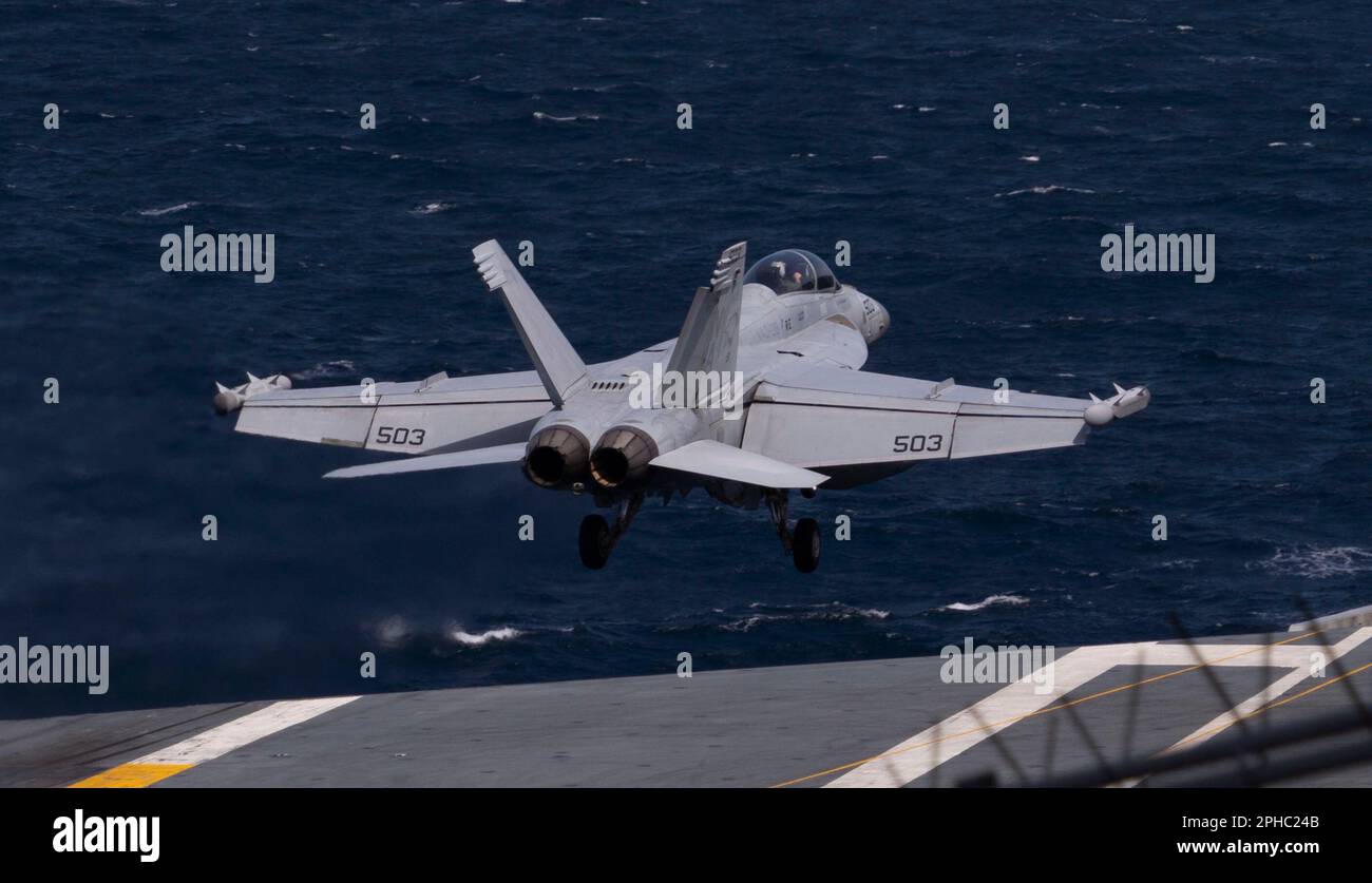 Busan, South Korea. 27th Mar, 2023. Members of the US Navy stand on ...