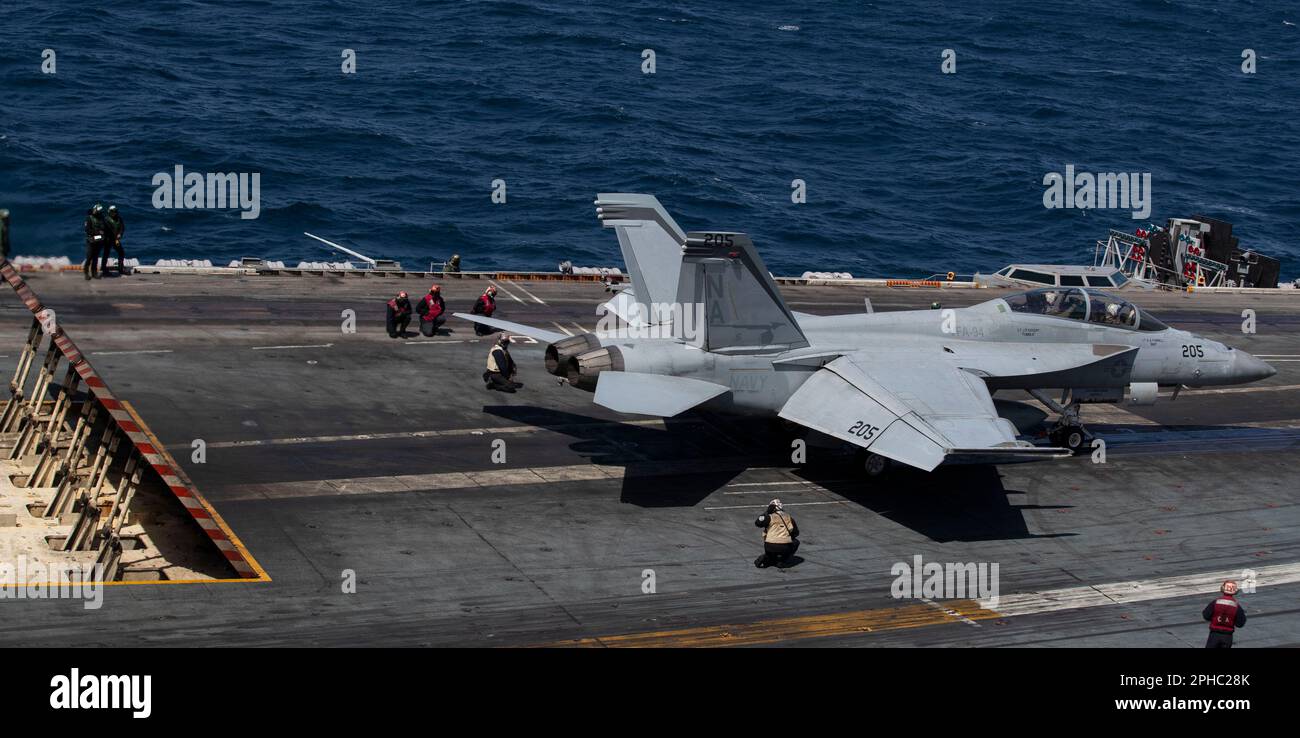 Busan, South Korea. 27th Mar, 2023. Members of the US Navy stand on ...