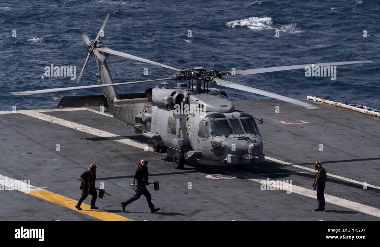 Busan, South Korea. 27th Mar, 2023. Members of the US Navy stand on ...