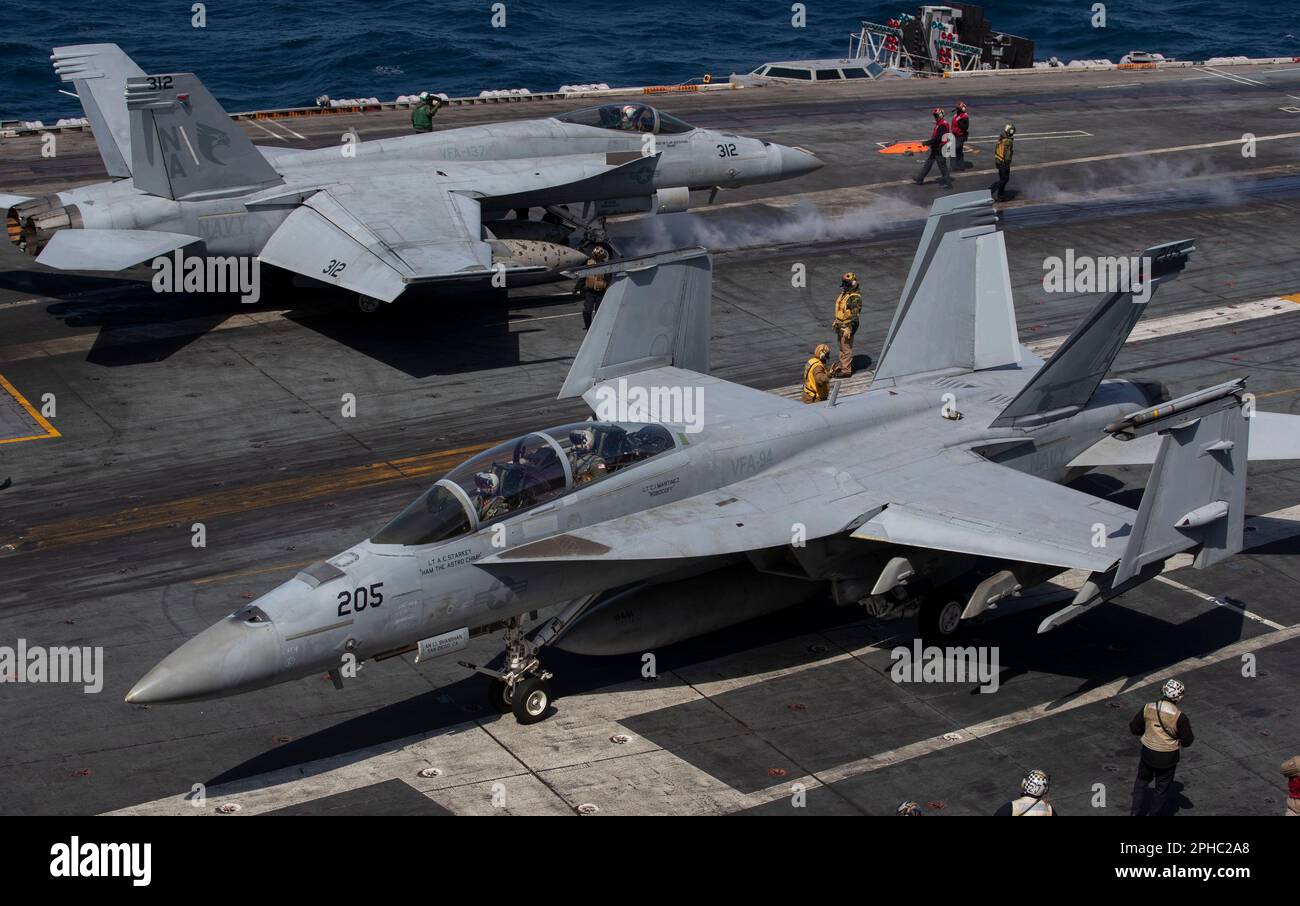 Busan, South Korea. 27th Mar, 2023. Members of the US Navy stand on ...