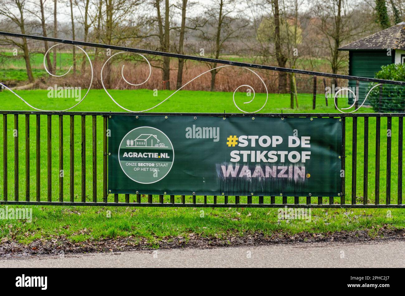 Bunnik, The Netherlands, March 24, 2023: fence of a farm with an action ...