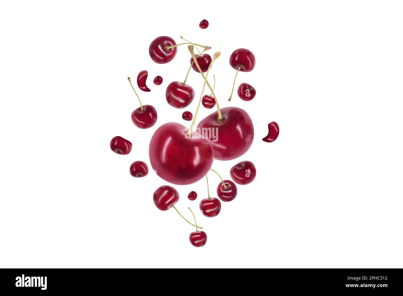 cherries falling on a white background Stock Photo - Alamy